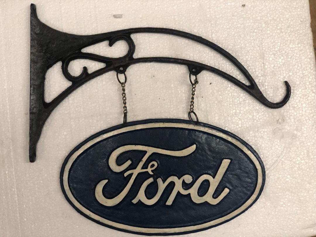 cast iron Ford sign – Jantiques LLC.